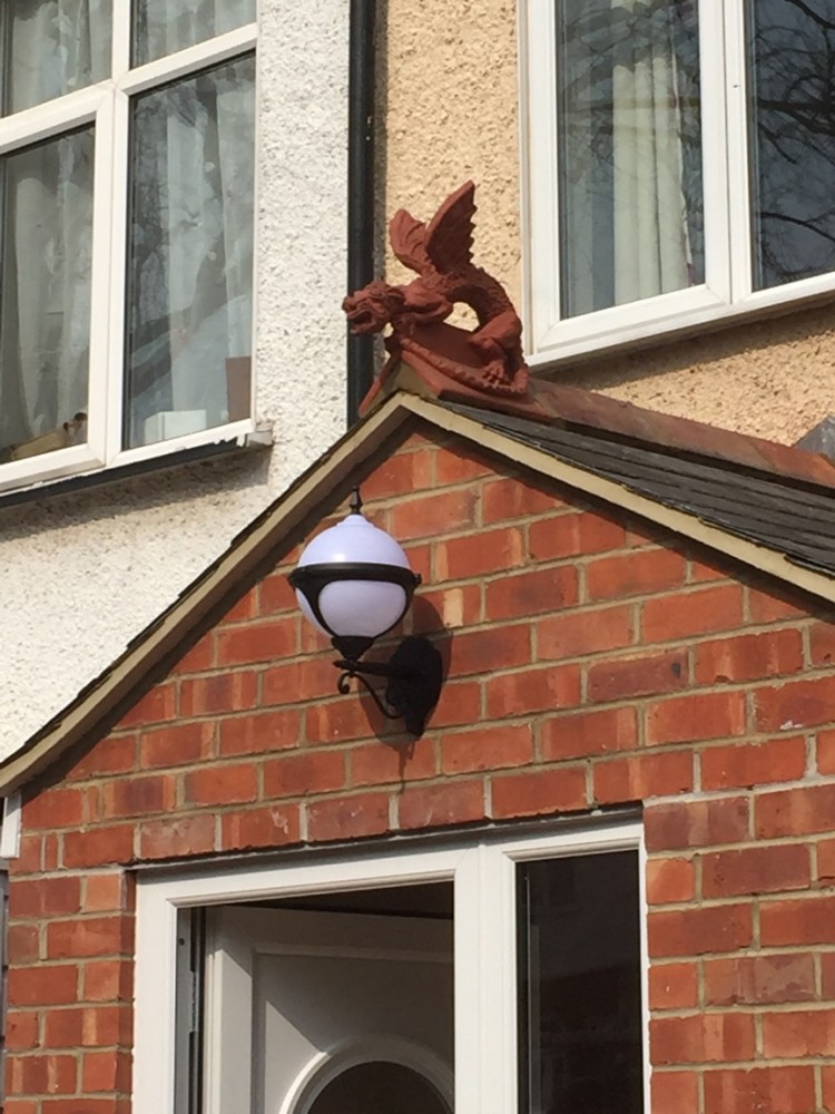 New & Repro Roof finial dragon on a 45 degree angled ridge tile ...